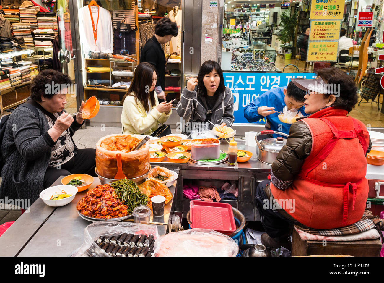 People eating at Changseondong meokja golmok (street food alley), Busan ...