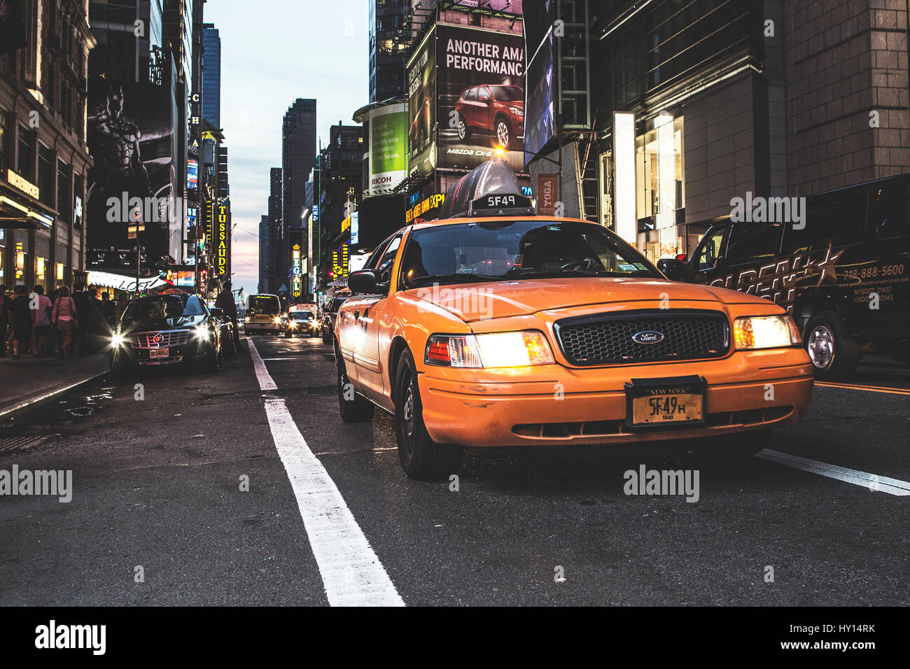 Yellow cab in the famous Times Square in Midtown Manhattan in New York ...