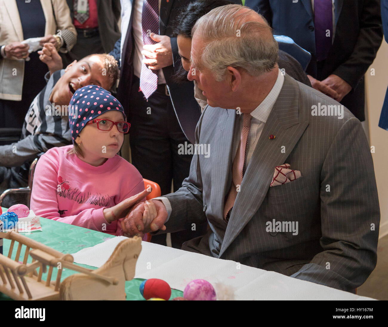 The Prince of Wales meets Maria Mihai, 11 , during a visit to the ...