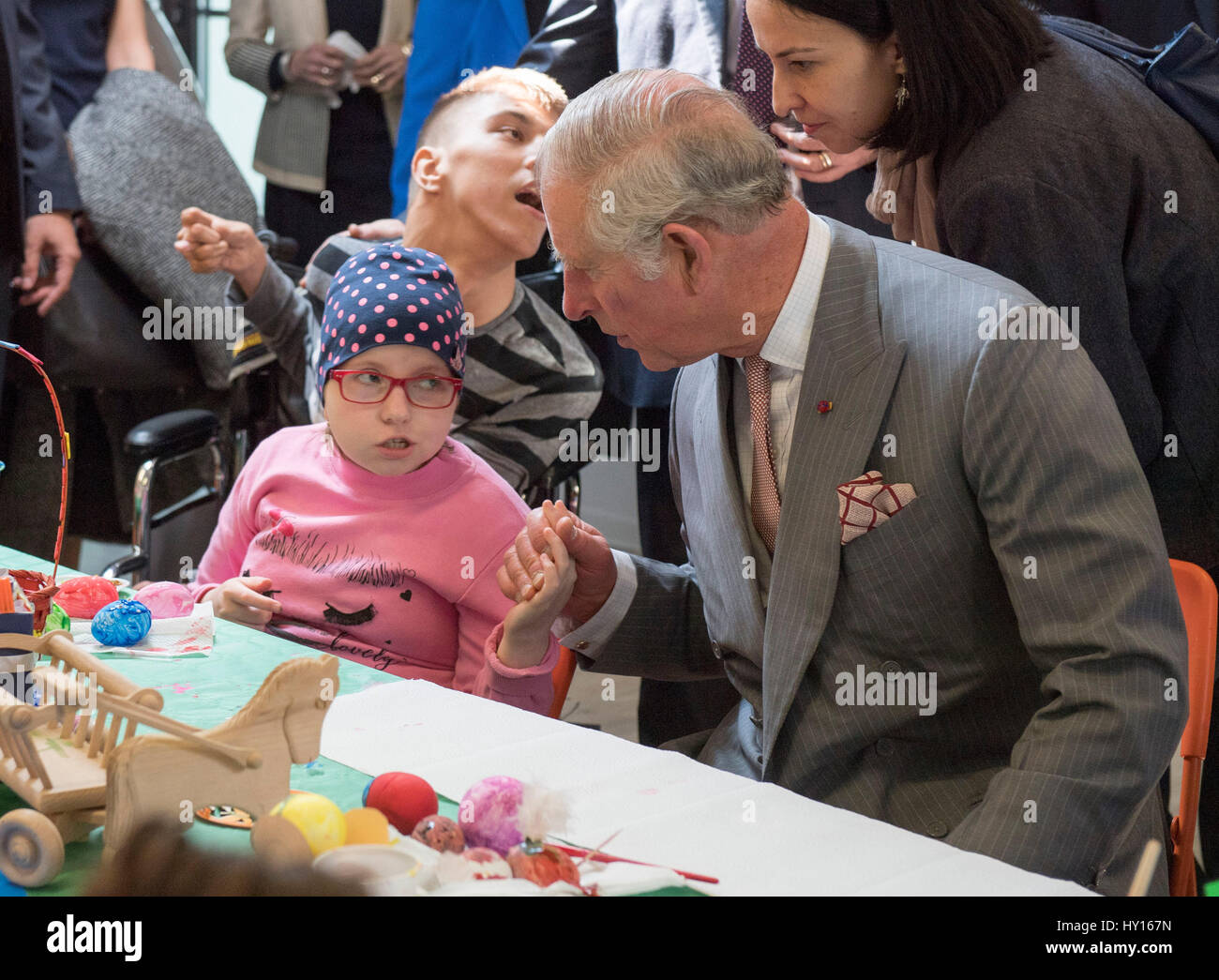 The Prince of Wales meets Maria Mihai, 11 , during a visit to the ...