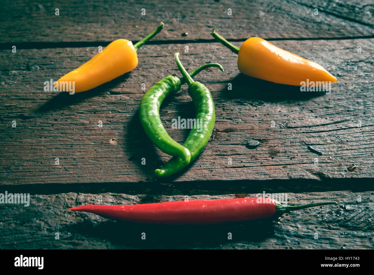 Human face made od three colored peppers Stock Photo - Alamy