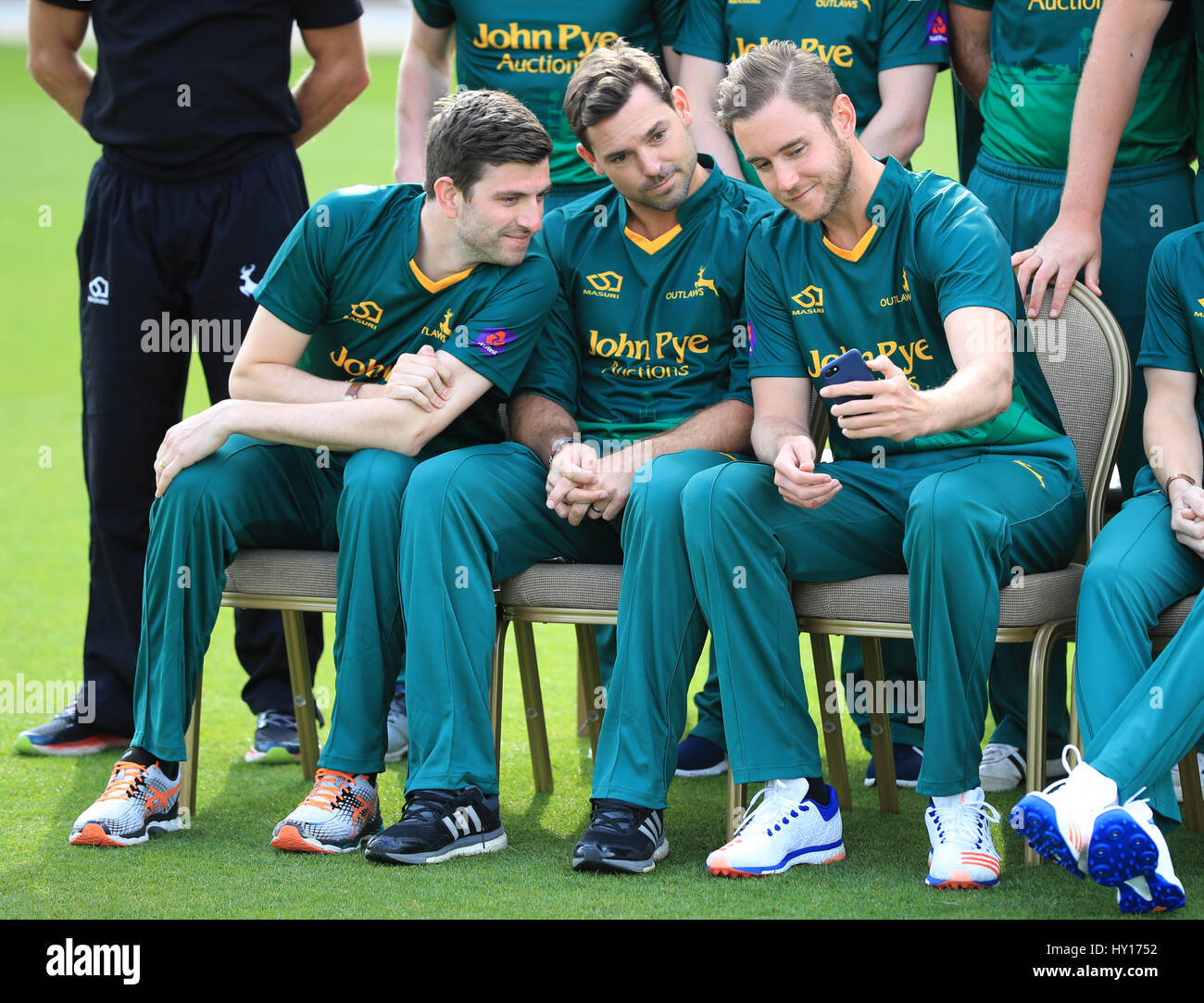 Harry Gurney (left), Michael Lumb and Stuart Broad (right) take a ...