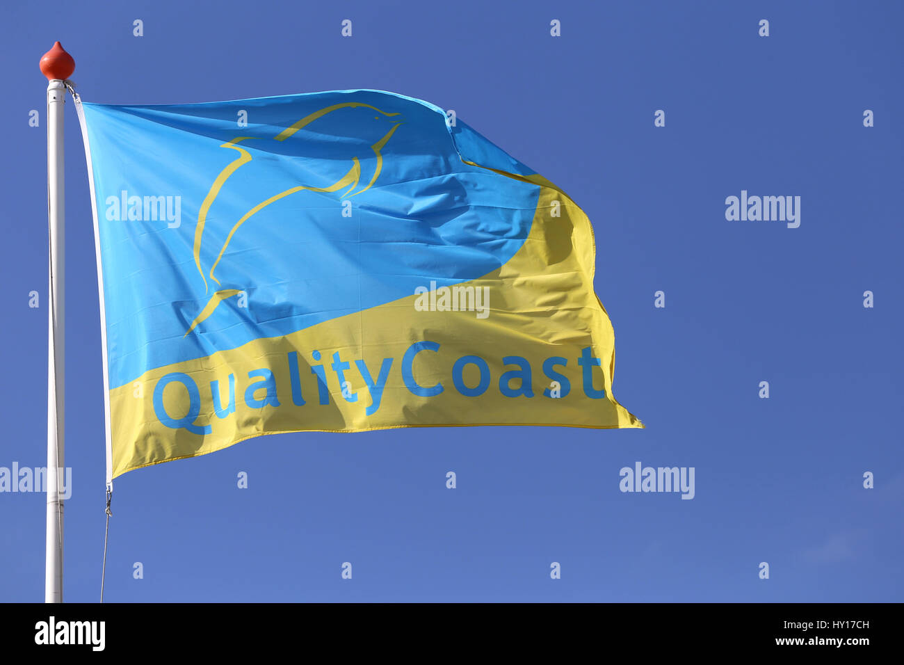 QualityCoast flag flying in the wind. QualityCoast is the largest ...