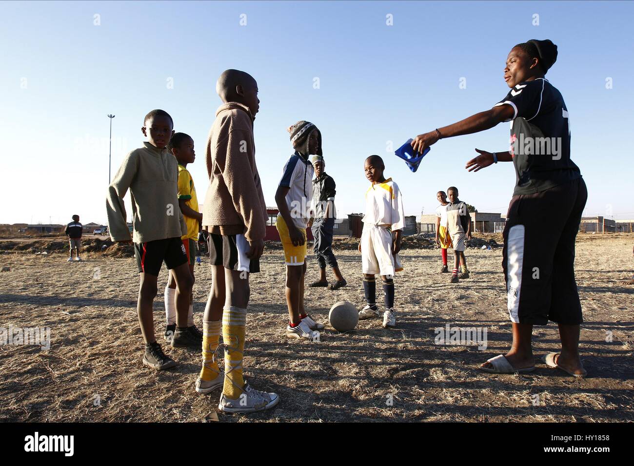 Black south african boys football hi-res stock photography and images ...