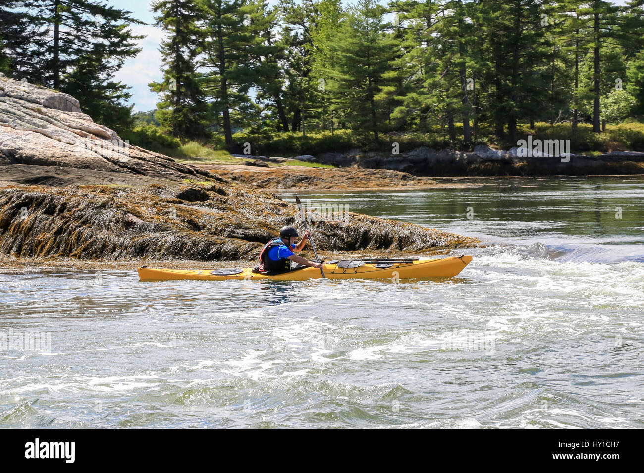 Kayaking in the rapid current of Lower Hell Gate Stock Photo - Alamy