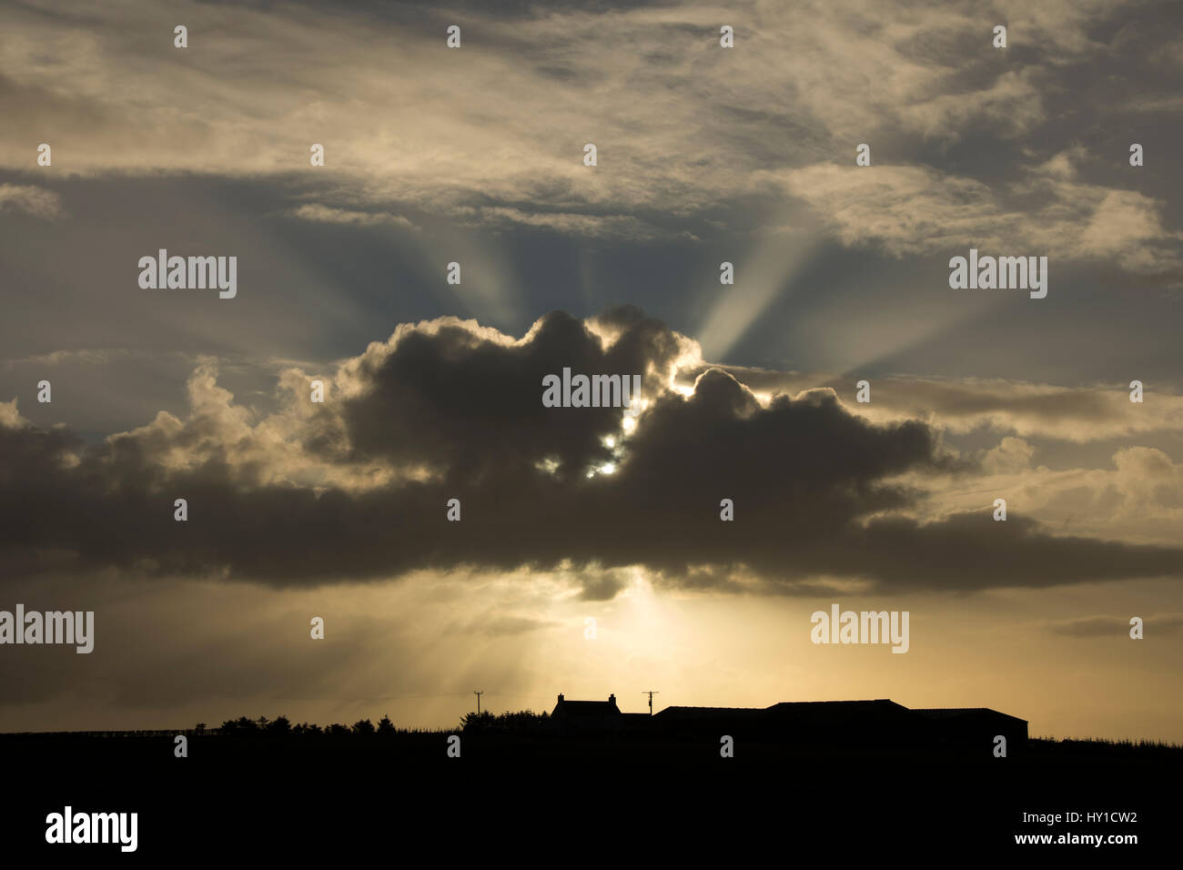 Clouds and sunbeams at Scarfskerry, Caithness, Scotland, UK Stock Photo ...