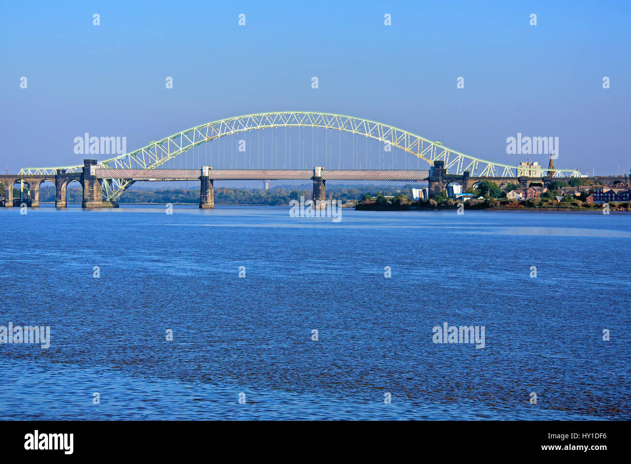 The massive arch of the Queensway bridge across the river Mersey ...