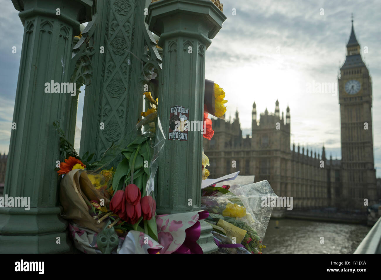 Floral tributes laid at Westminster Bridge outside Houses of Parliament ...