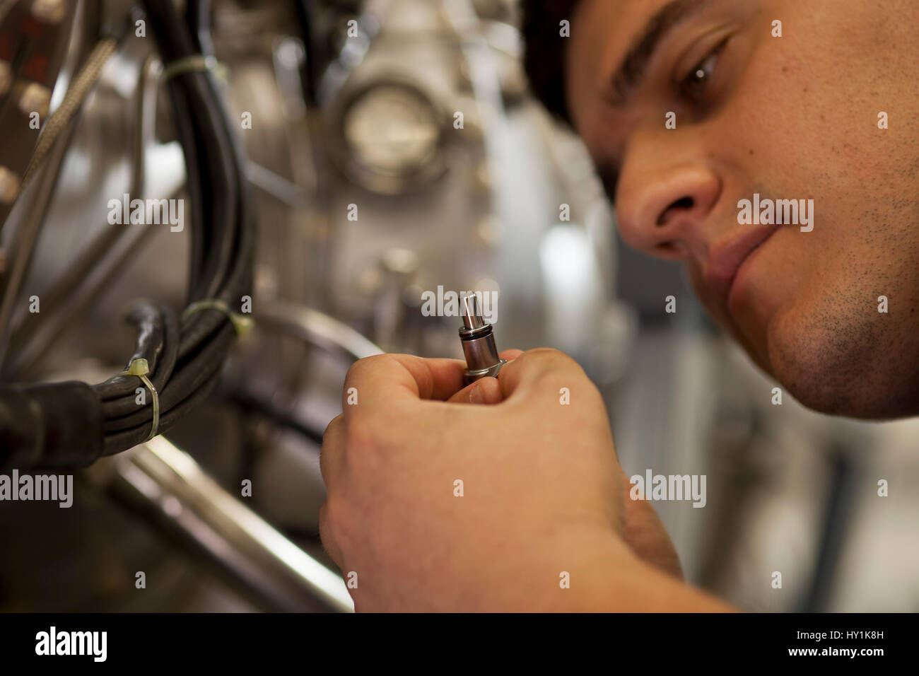 Factory worker - mechanic - engine pieces inspection, Brazil Stock ...