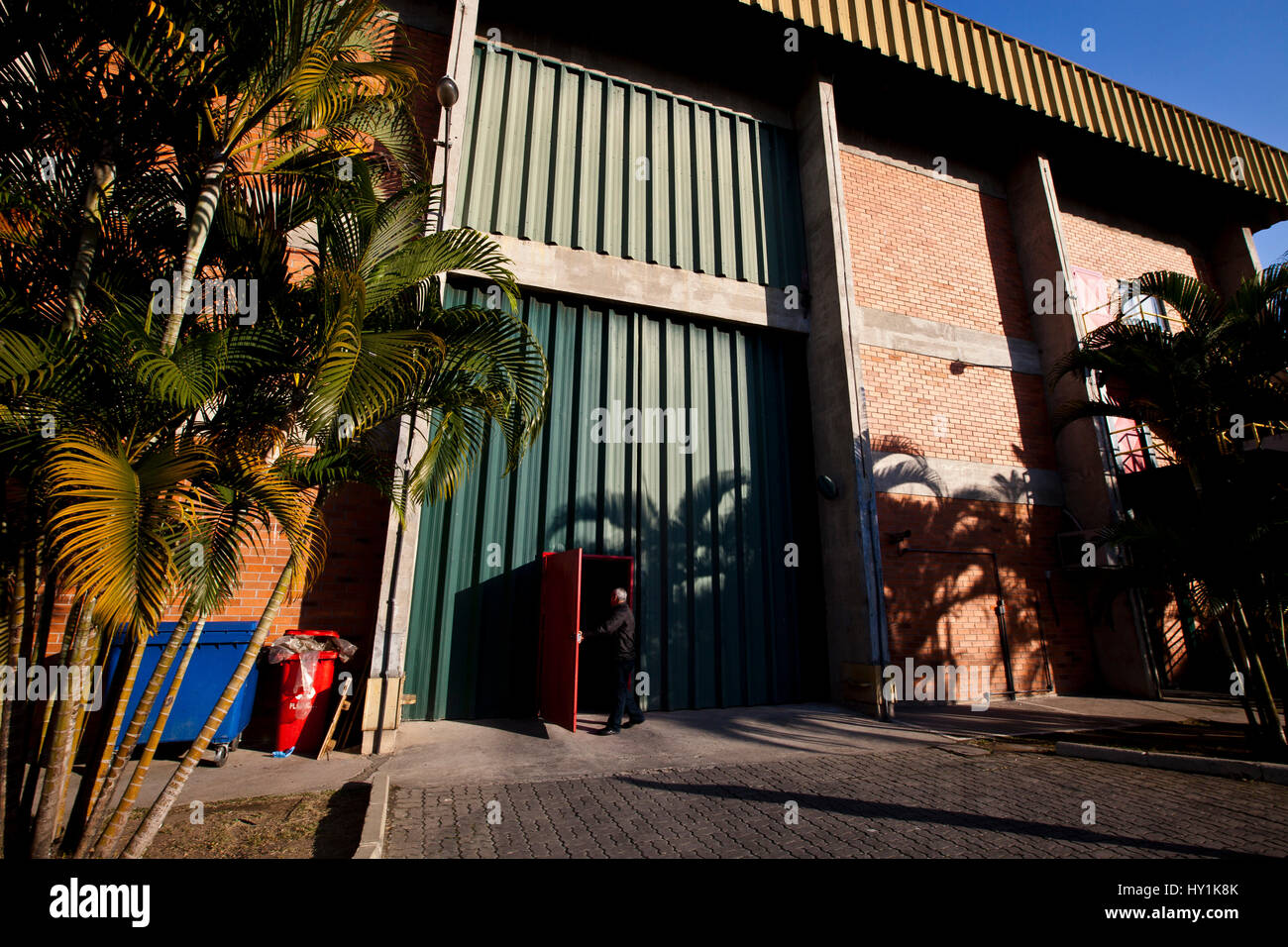 Factory main entrance, front view of industrial building, employee ...