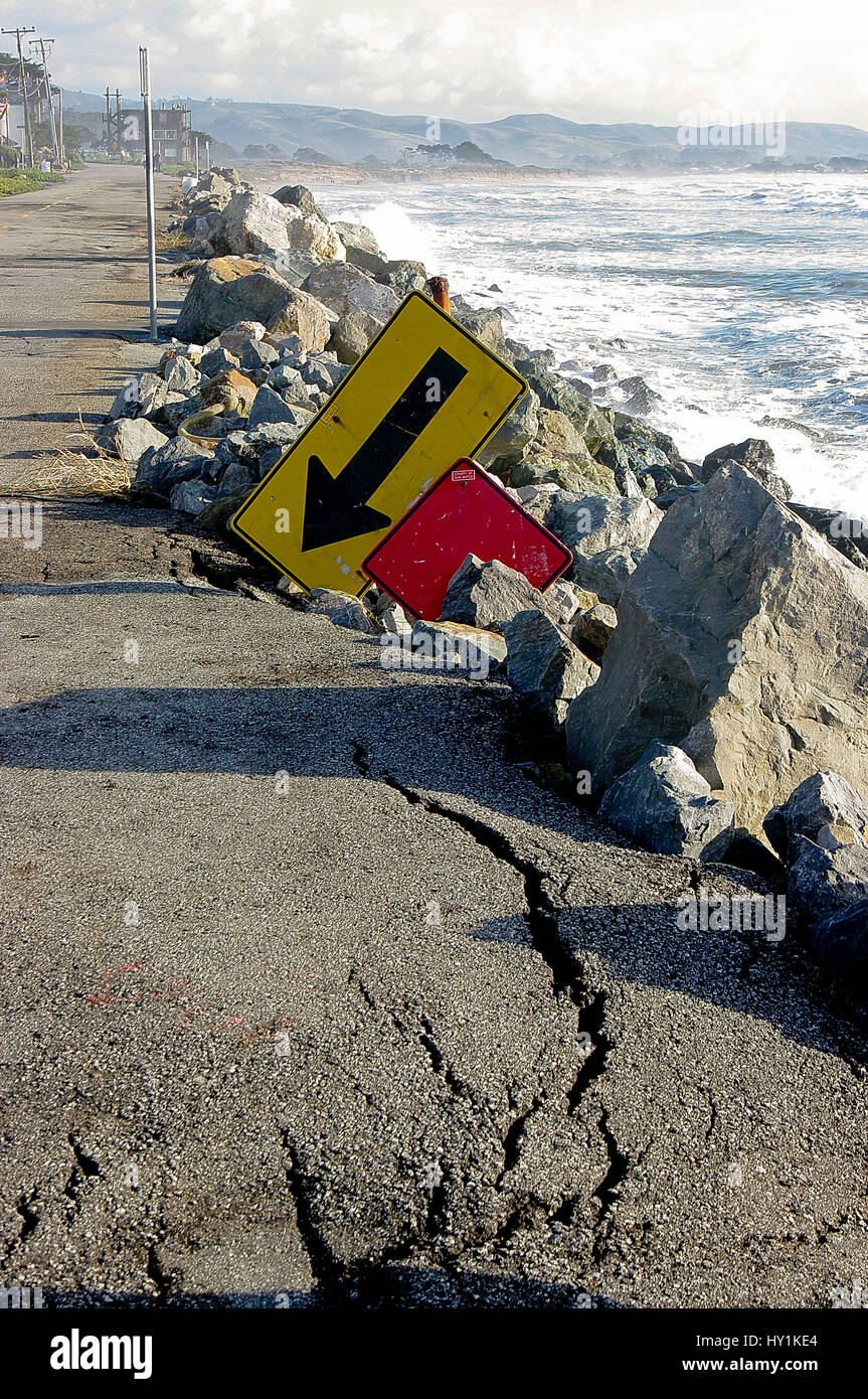 Wave Action Erosion Topples Road Signs Stock Photo - Alamy