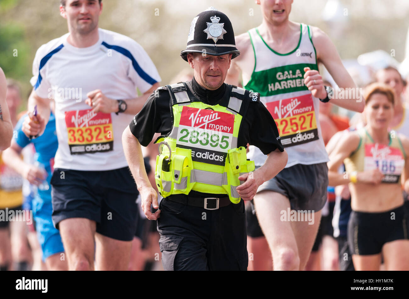 London Marathon Charity Male Runner Dressed As Policeman Stock Photo ...
