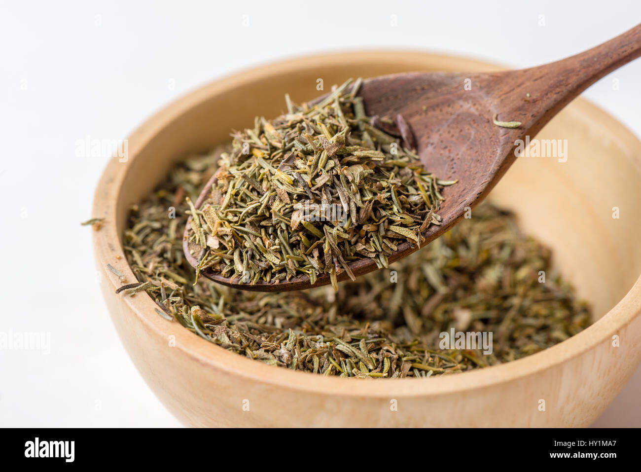 dried thyme leaves on white background, fragrant herb Stock Photo - Alamy