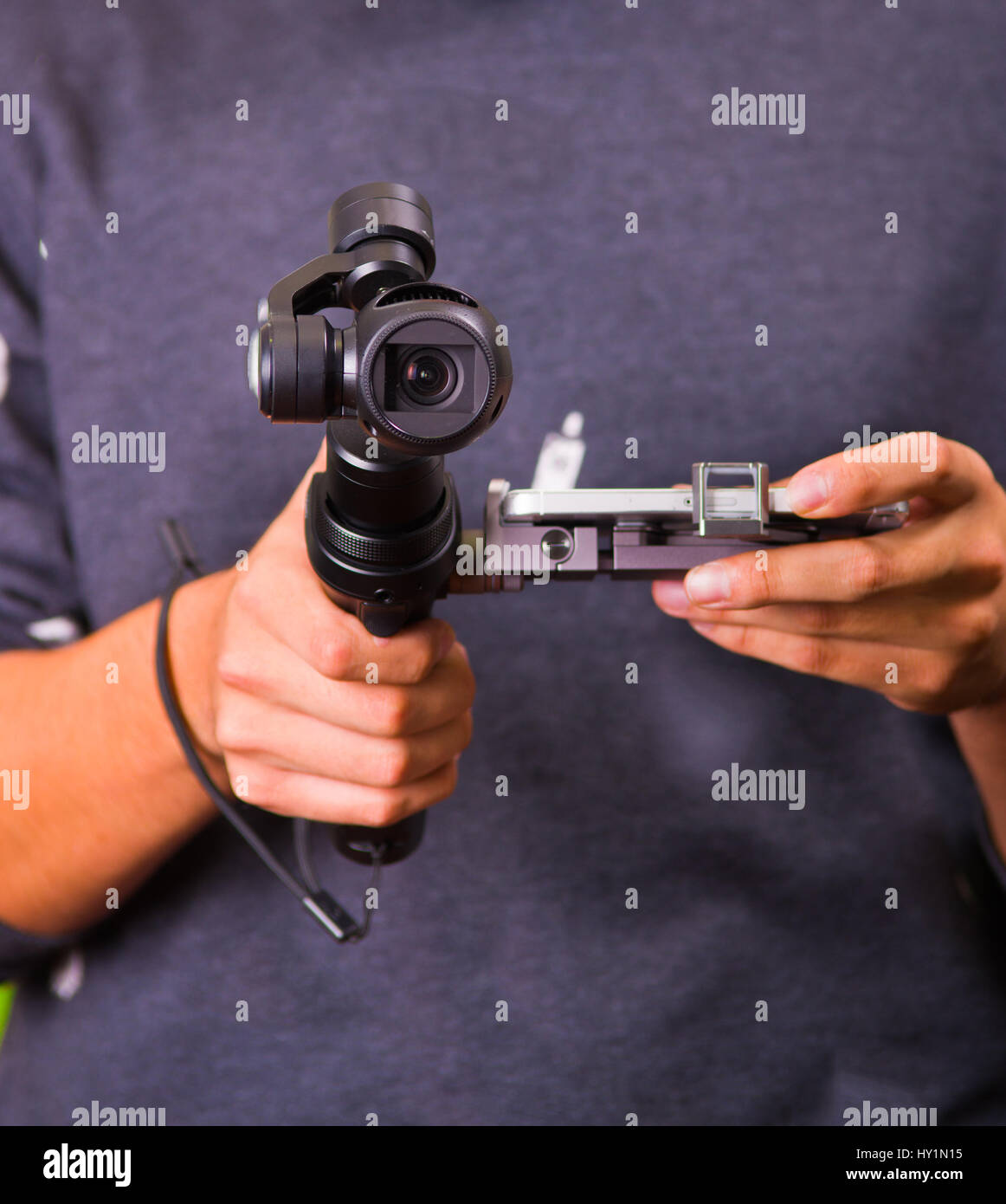 Hand held camera stabilizer for cell phone Stock Photo - Alamy