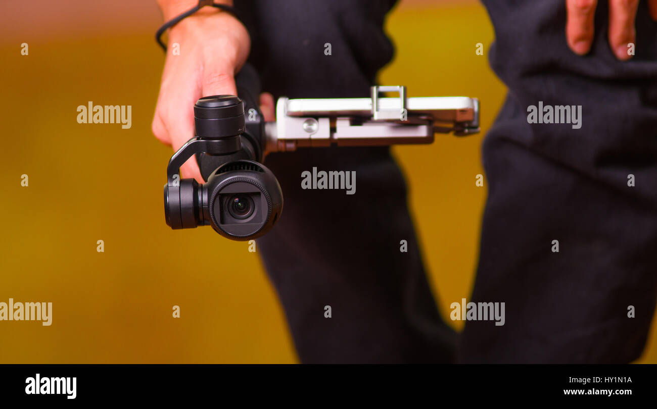 Hand held camera stabilizer for cell phone Stock Photo - Alamy