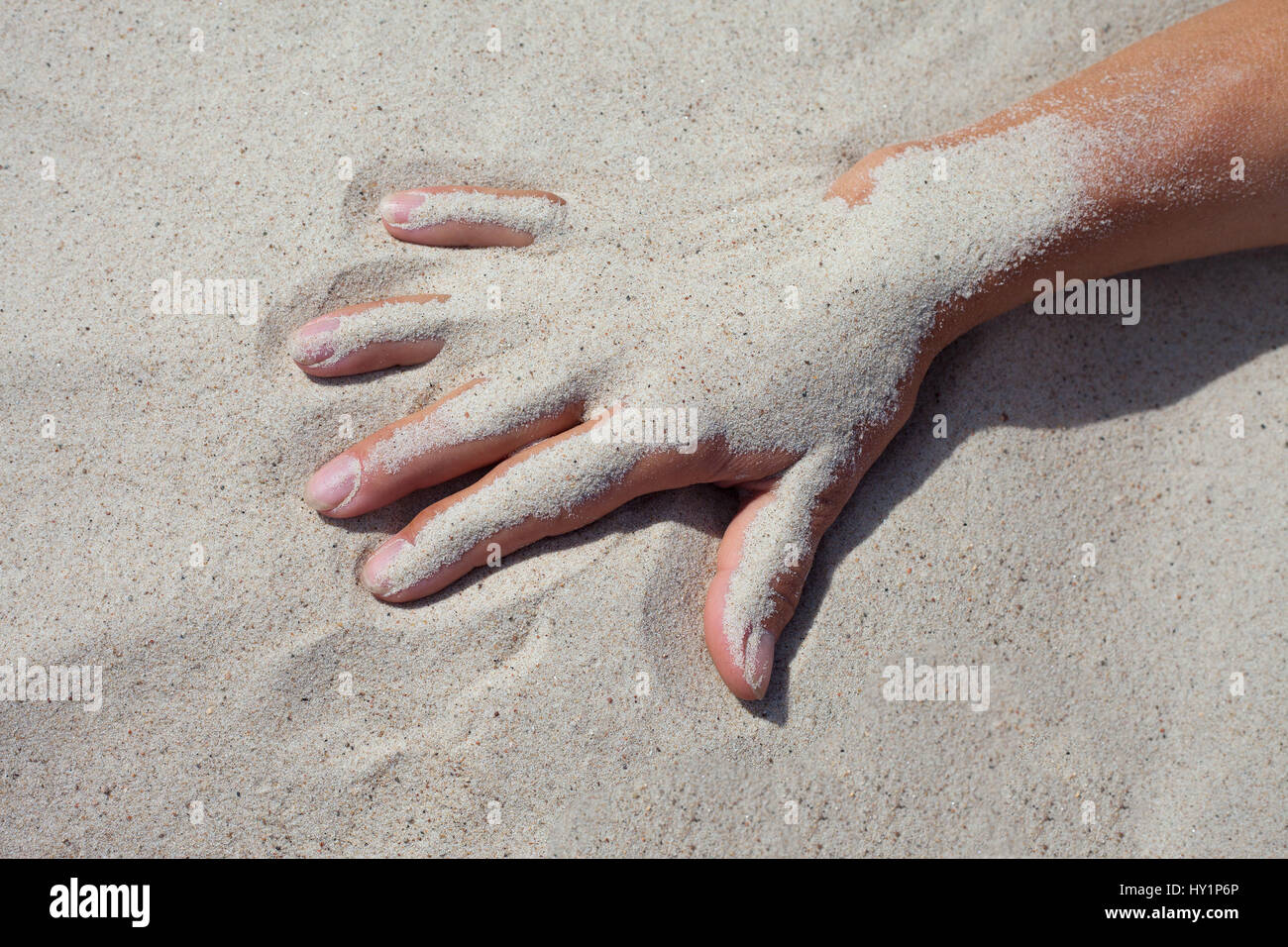Beach, sand and hand Stock Photo - Alamy