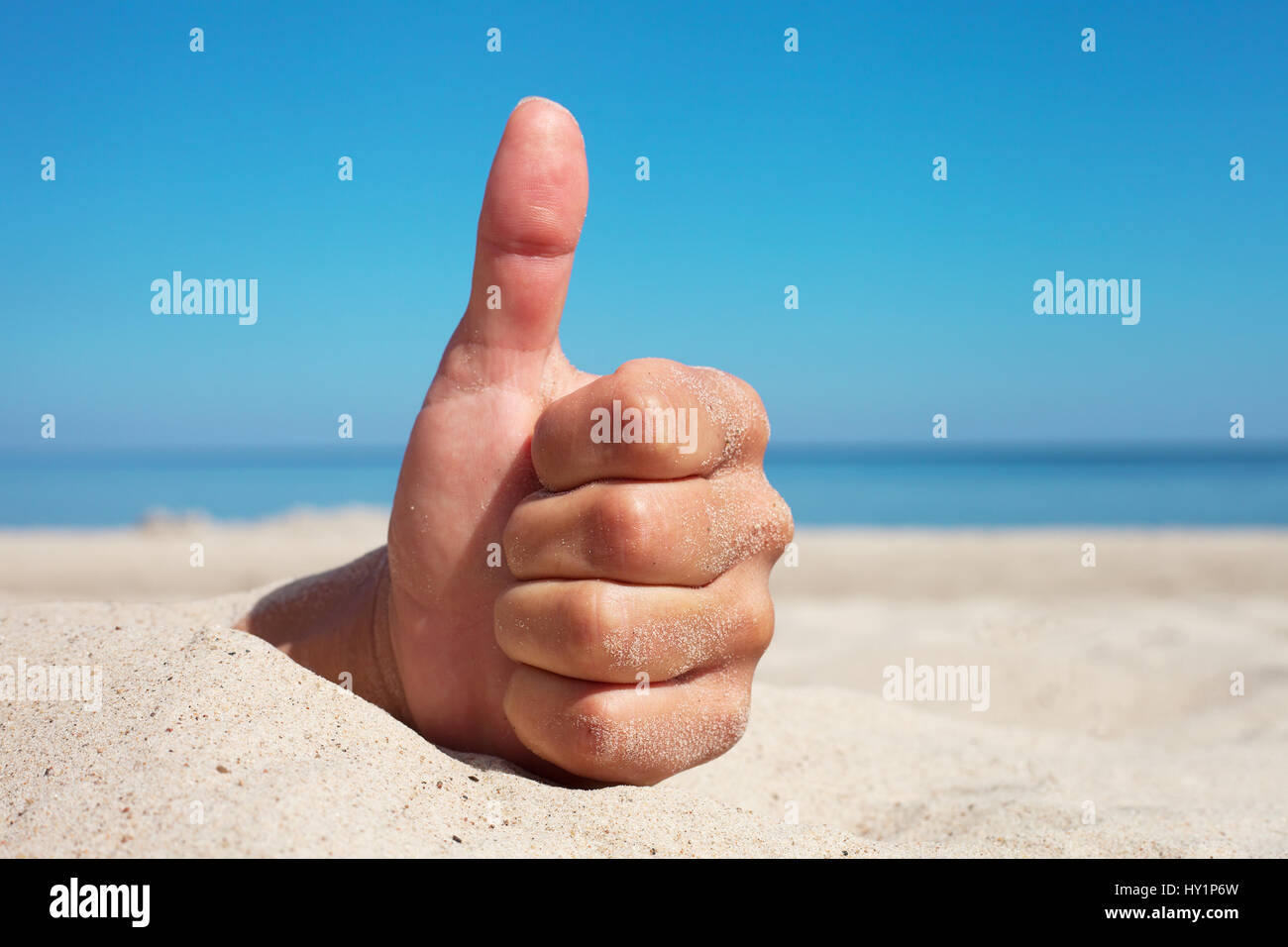 Beach, sand and hand Stock Photo - Alamy