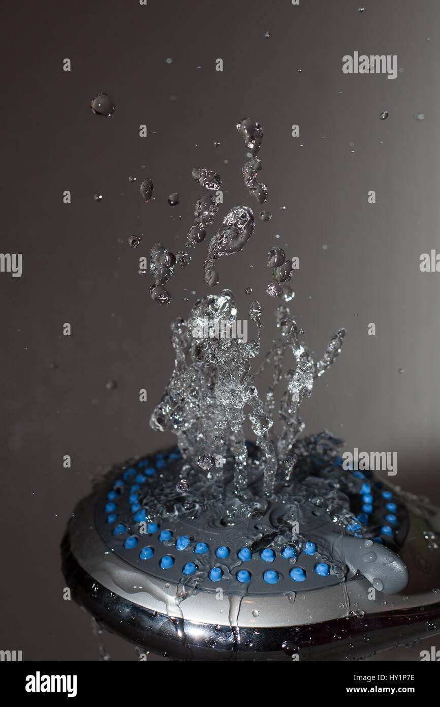 Shower head and flying water drops Stock Photo - Alamy