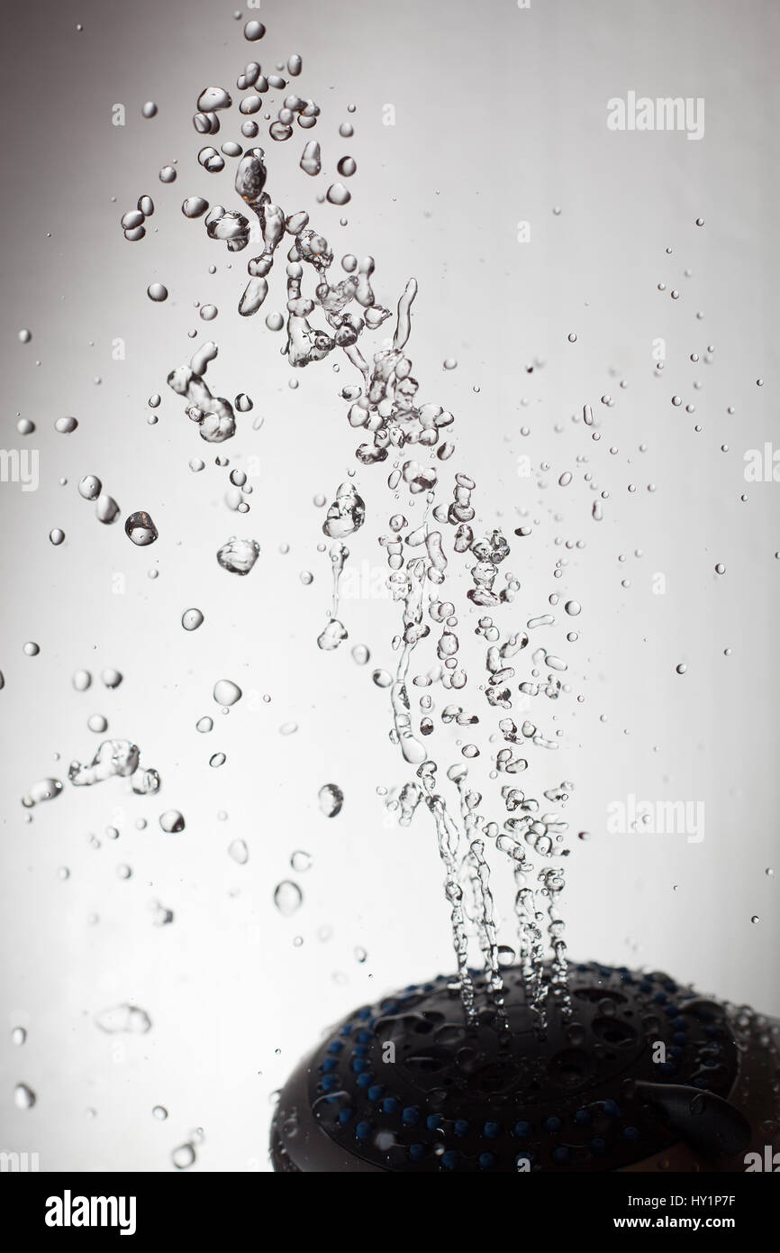 Shower head and flying water drops Stock Photo - Alamy