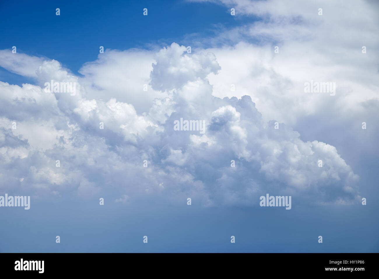 View on cumulus clouds from the plain Stock Photo - Alamy