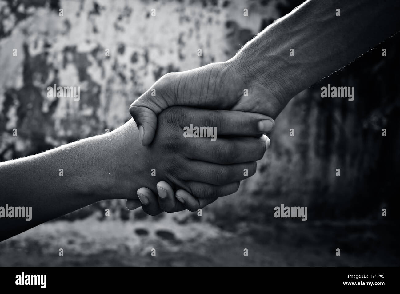 Team work. Human hands joined together Stock Photo - Alamy