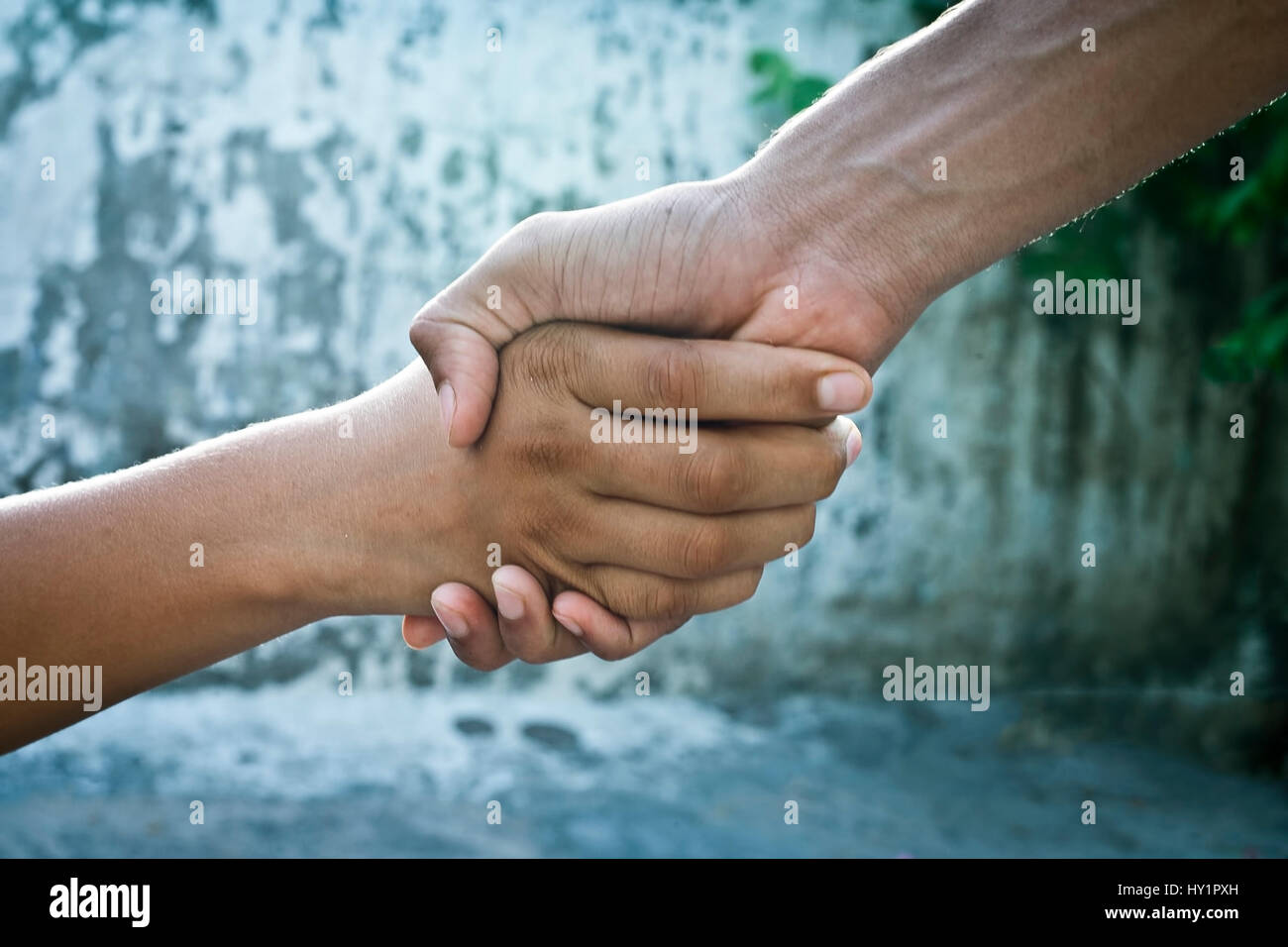Team work. Human hands joined together Stock Photo - Alamy