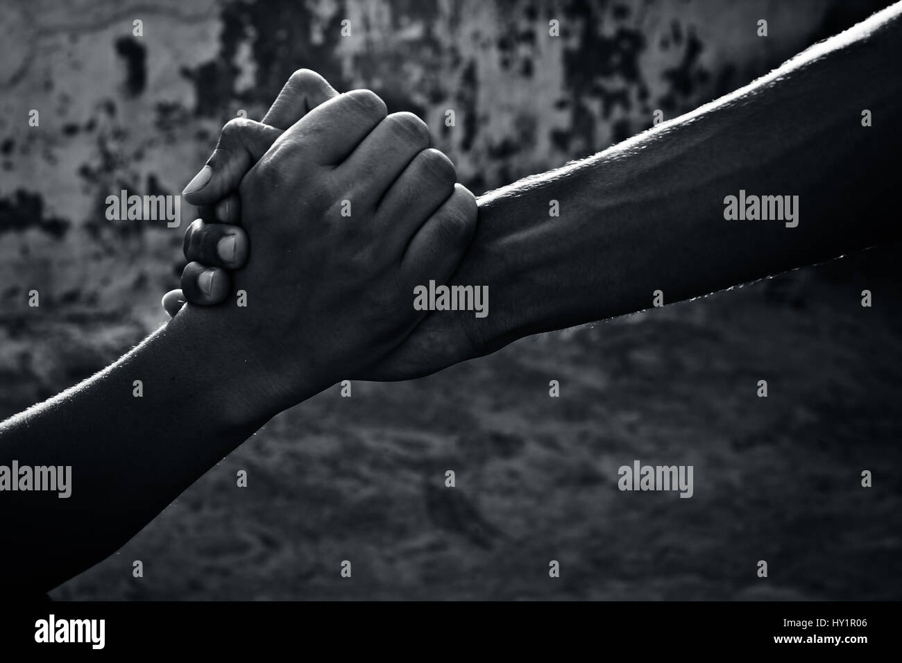 Team work. Human hands joined together Stock Photo - Alamy