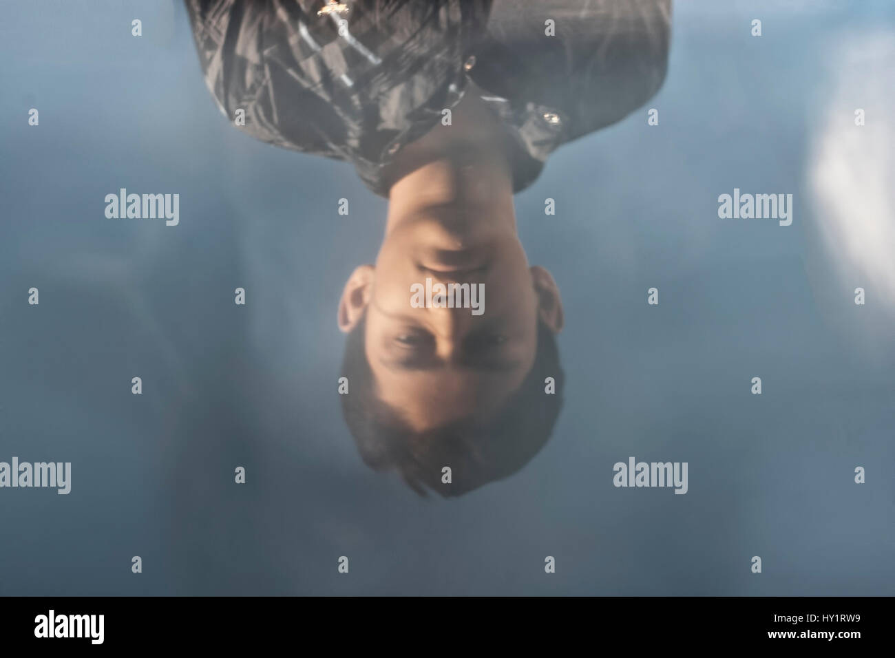 A boy sitting alone feeling to alone Stock Photo - Alamy