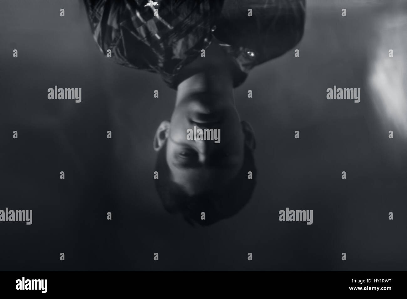 A boy sitting alone feeling to alone Stock Photo - Alamy