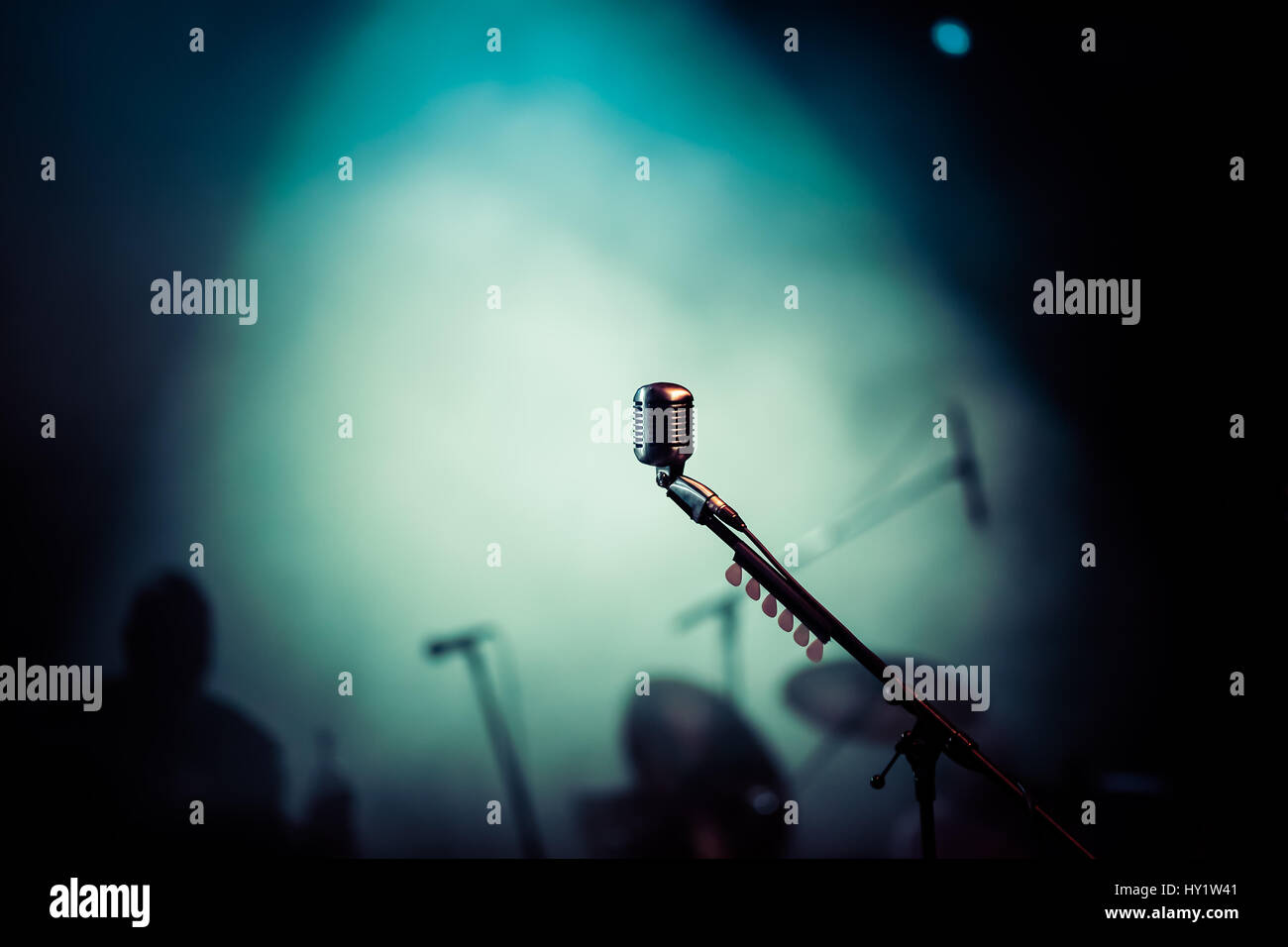 microphone in stage lights during concert Stock Photo - Alamy