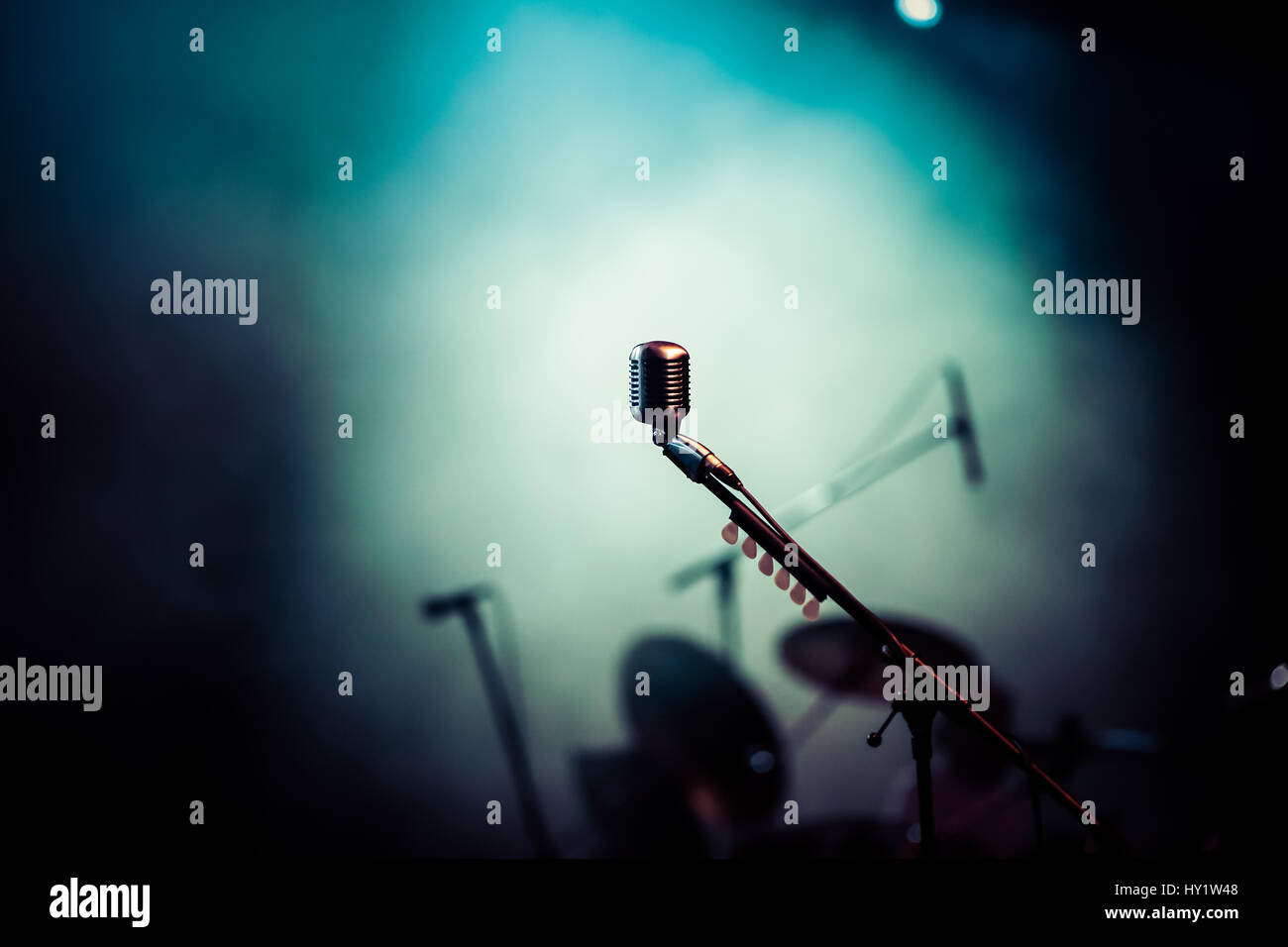 microphone in stage lights during concert Stock Photo - Alamy