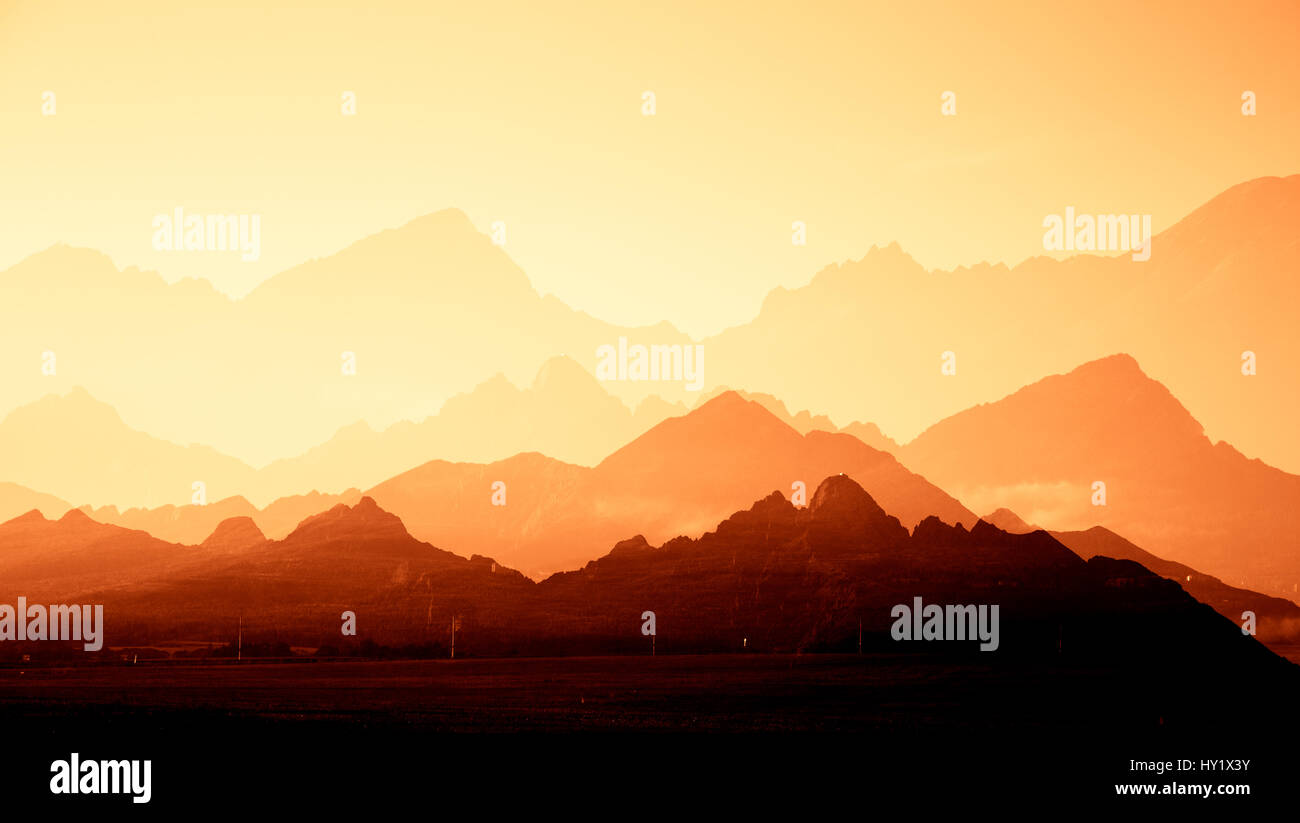 A beautiful, colorful, abstract mountain landscape in a red tonality ...