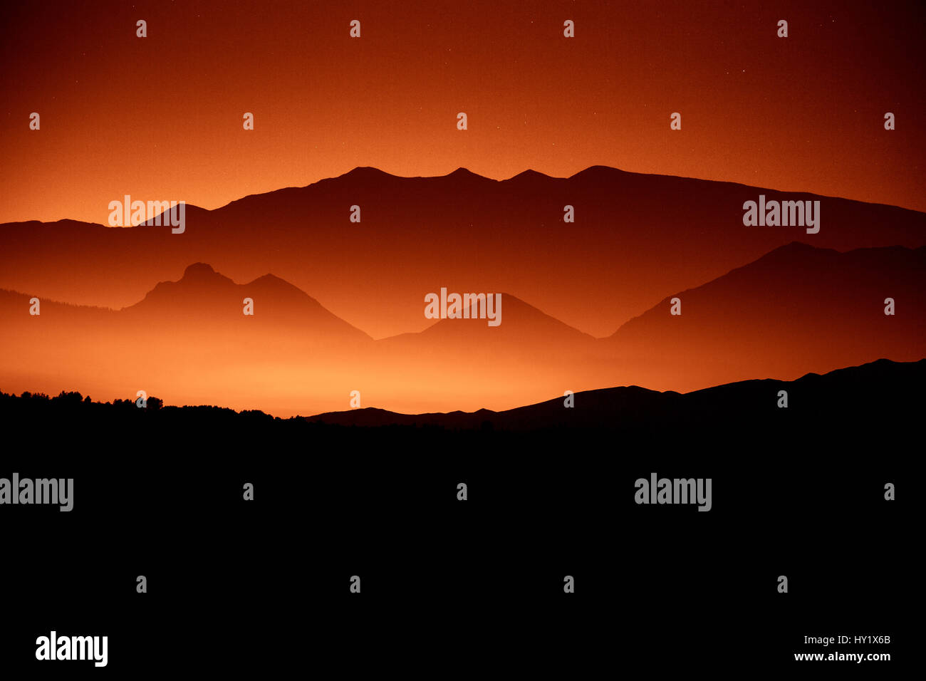 A beautiful, colorful, abstract mountain landscape in a red tonality ...