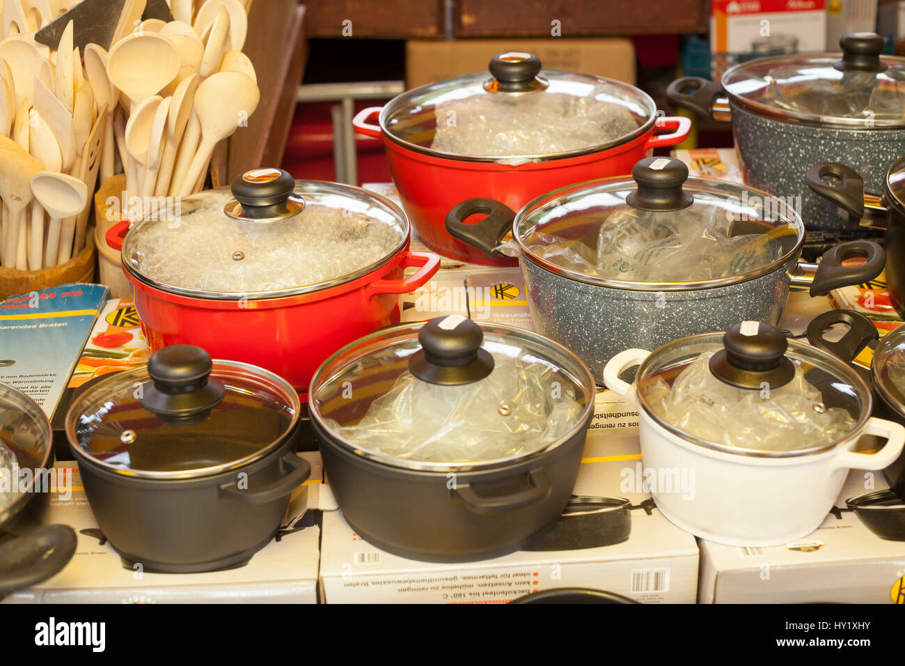 Cooking pots in a market stall Stock Photo - Alamy