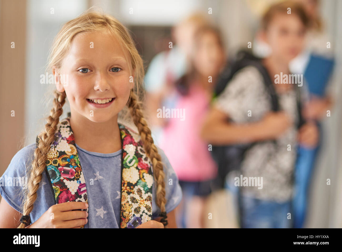 Cheerful girl during break at school Stock Photo - Alamy