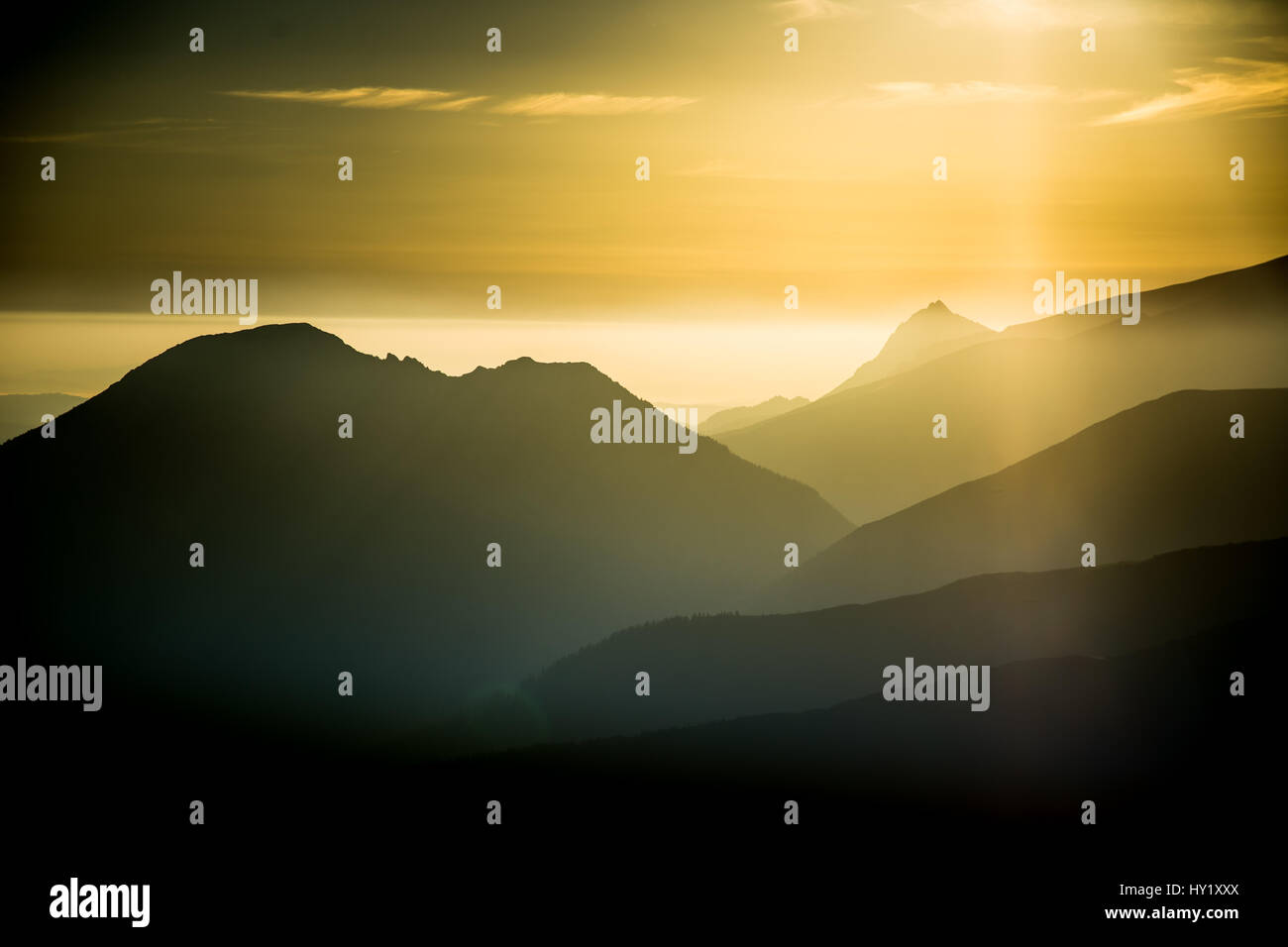 A beautiful, colorful, abstract mountain landscape with sun with a hot ...