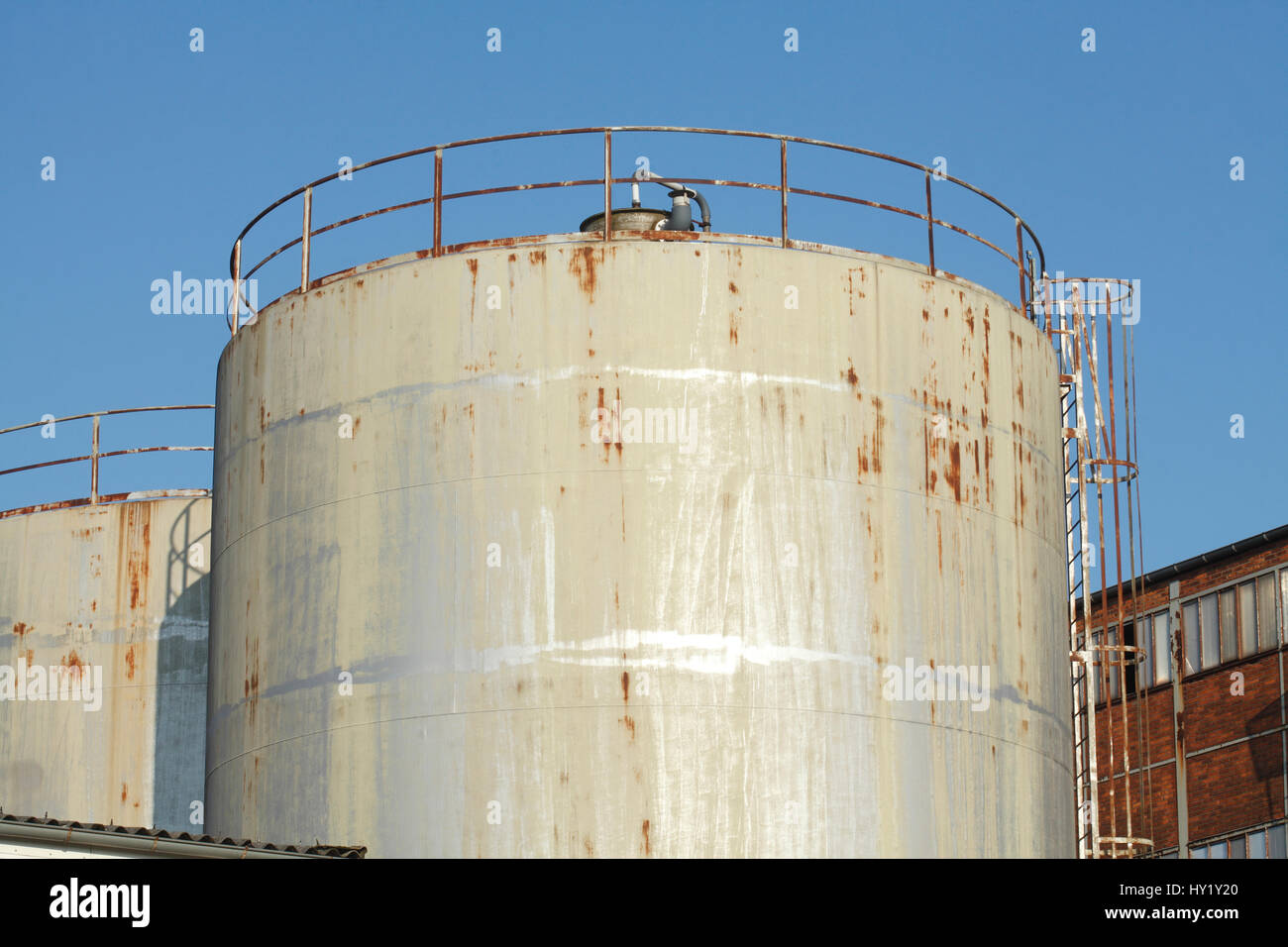 Rusty oil tanks hi-res stock photography and images - Alamy