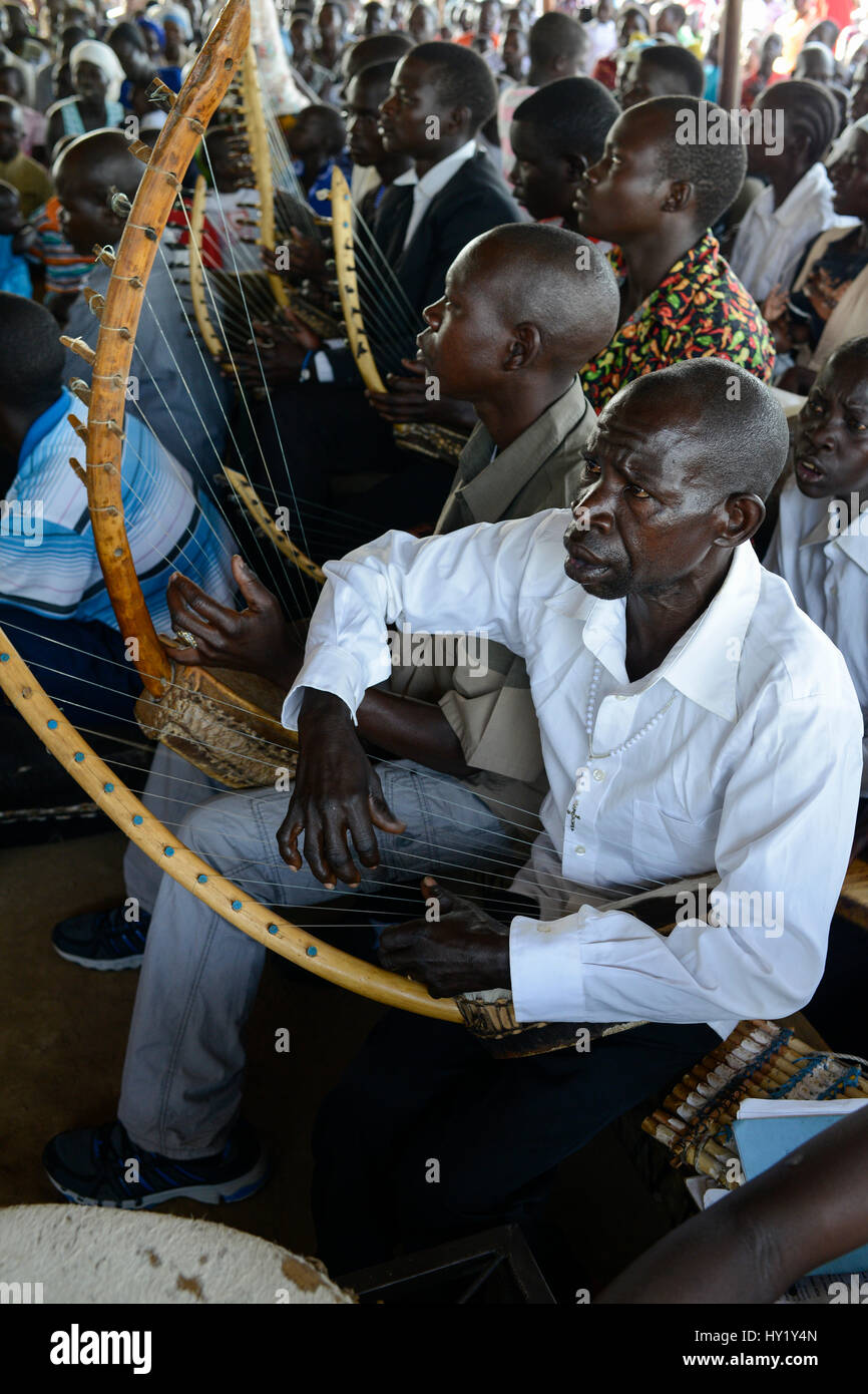 UGANDA, Arua, holy mass on sunday, musician play Enanga string ...