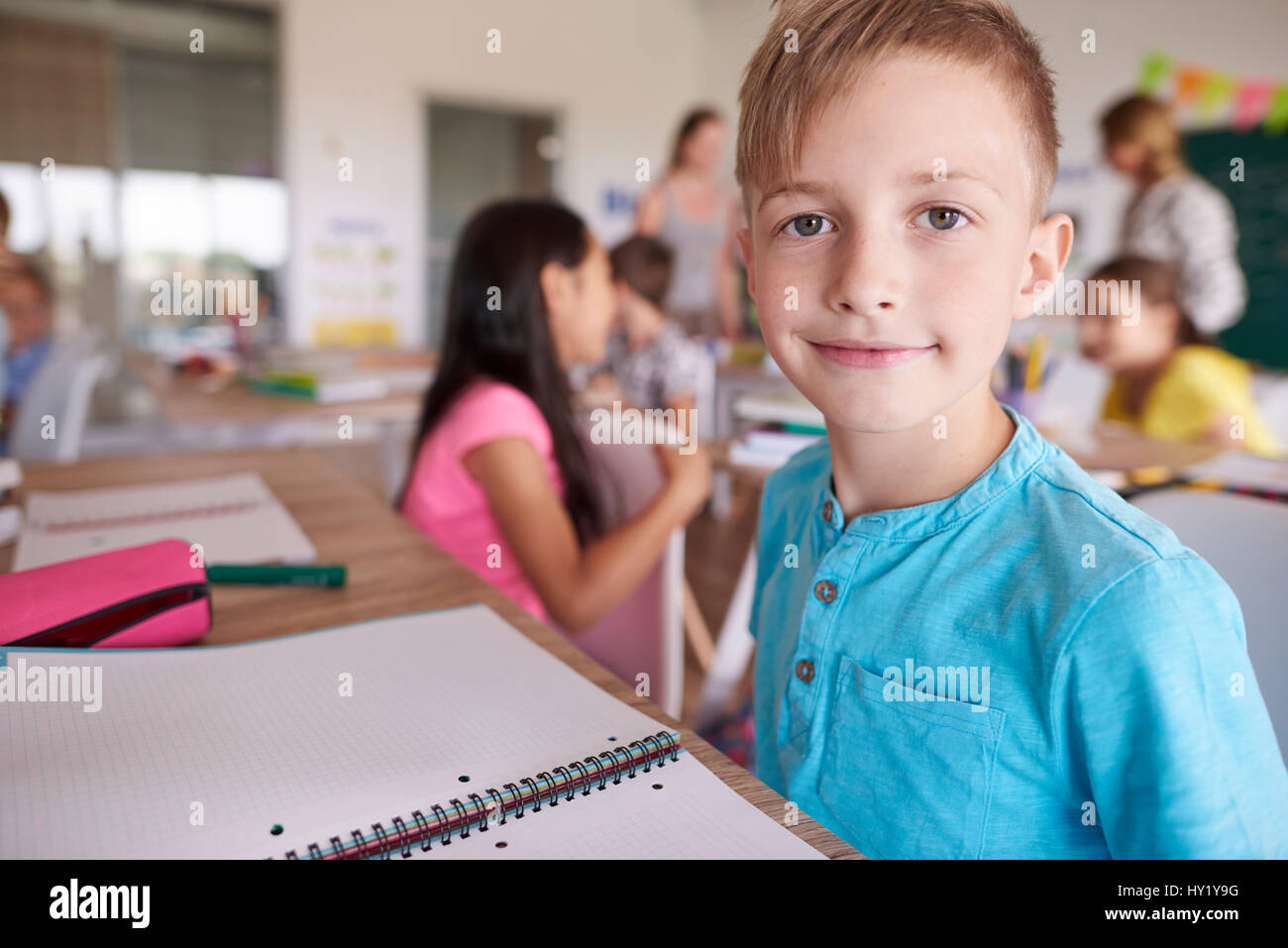 Asian boy writing hi-res stock photography and images - Alamy