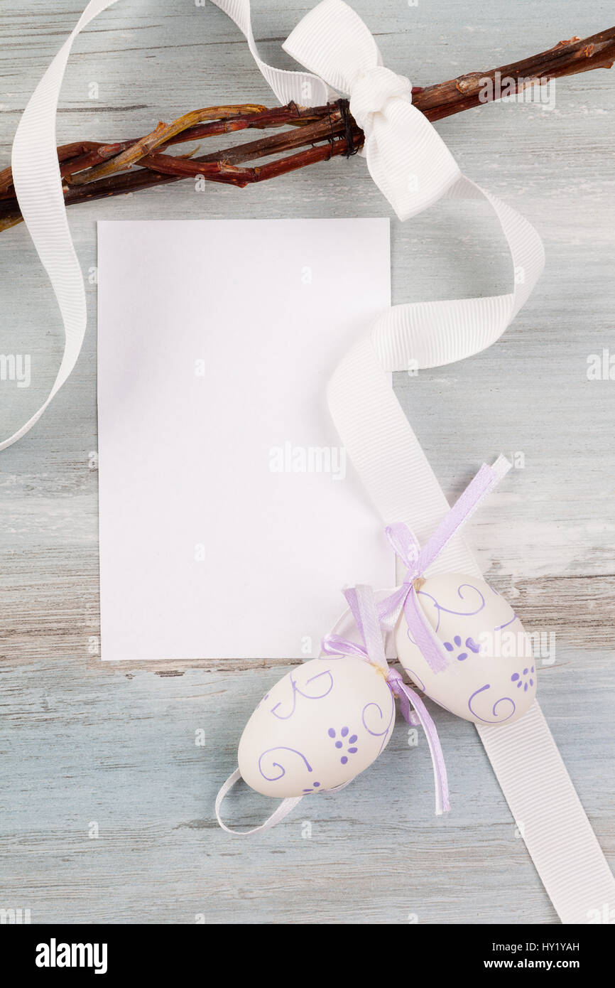Traditional easter background. Easter whip with ribbon and blank label ...