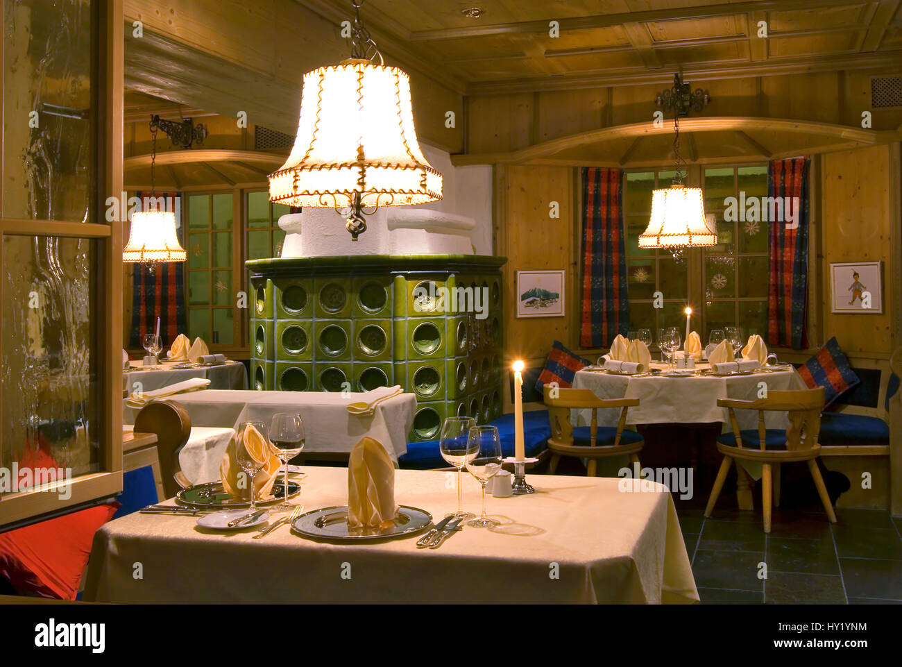 This Stock Photo shows a candle light dinner set of a typical Swiss ...