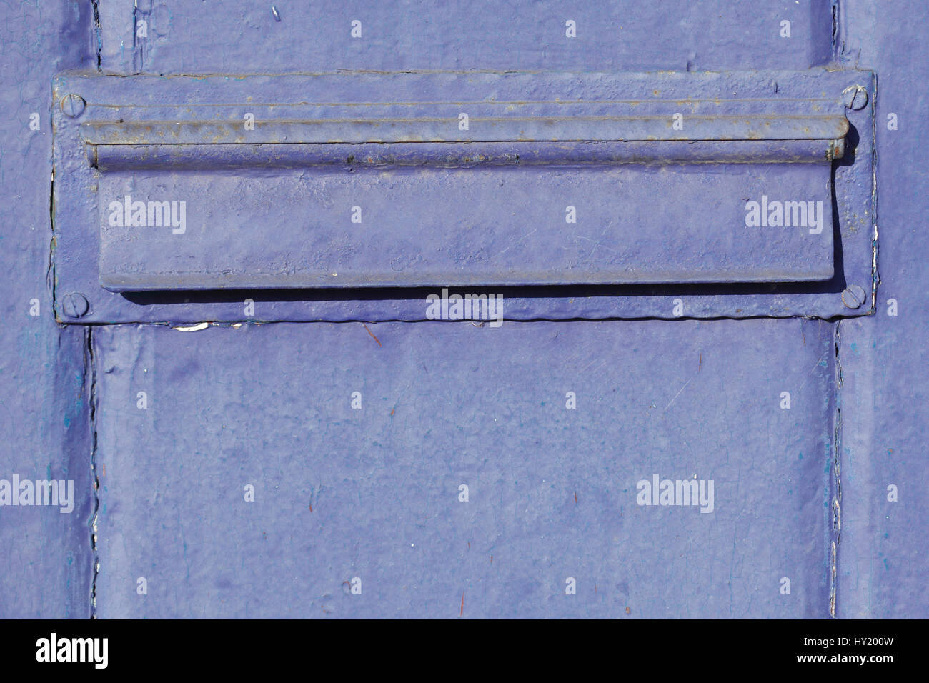 blue-purple letterbox with letter slot Stock Photo - Alamy