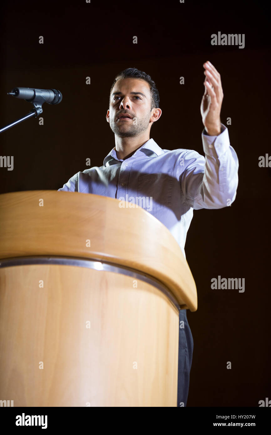 Business executive giving a speech at conference center Stock Photo - Alamy