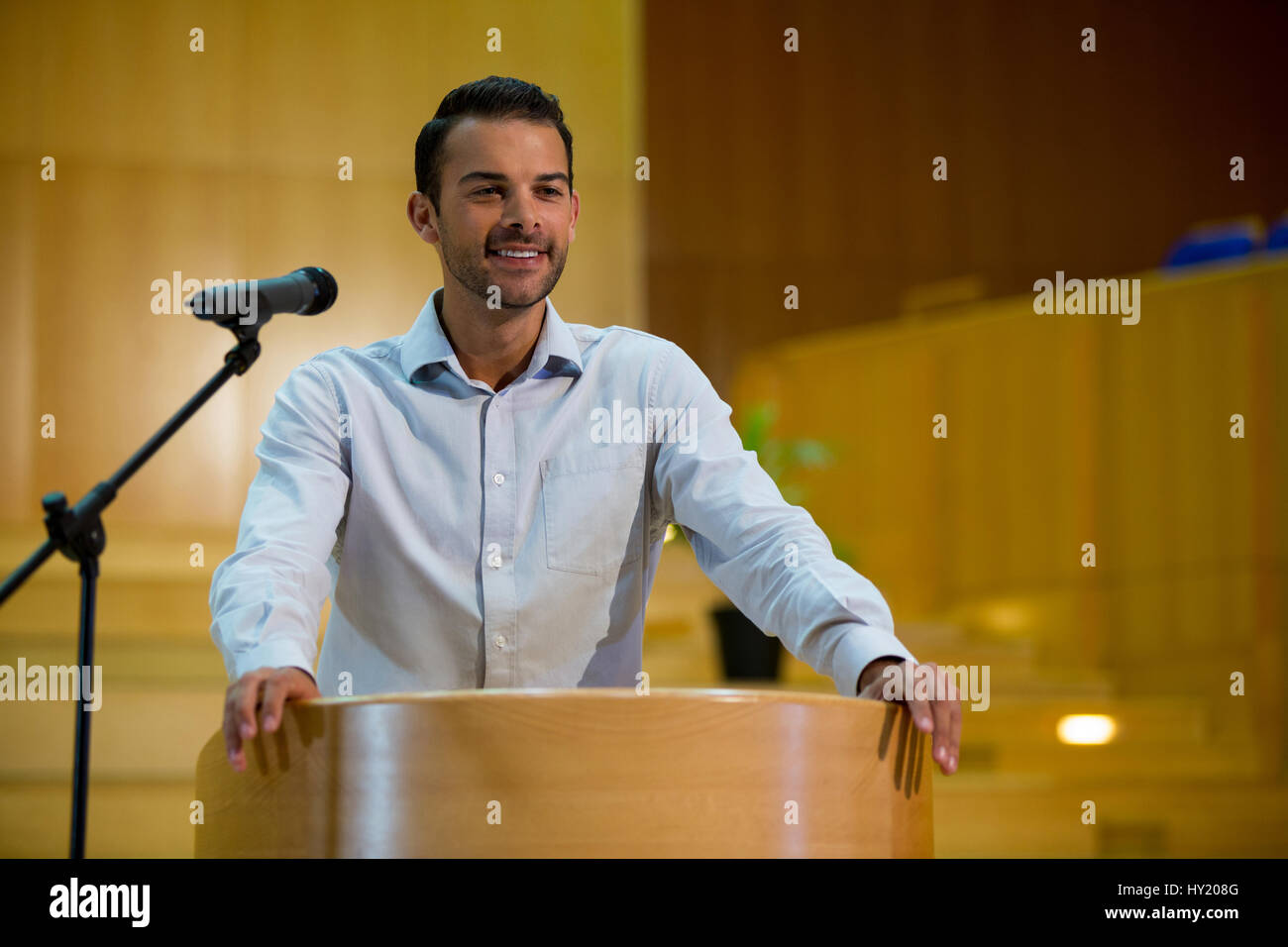 Business executive giving a speech at conference center Stock Photo - Alamy