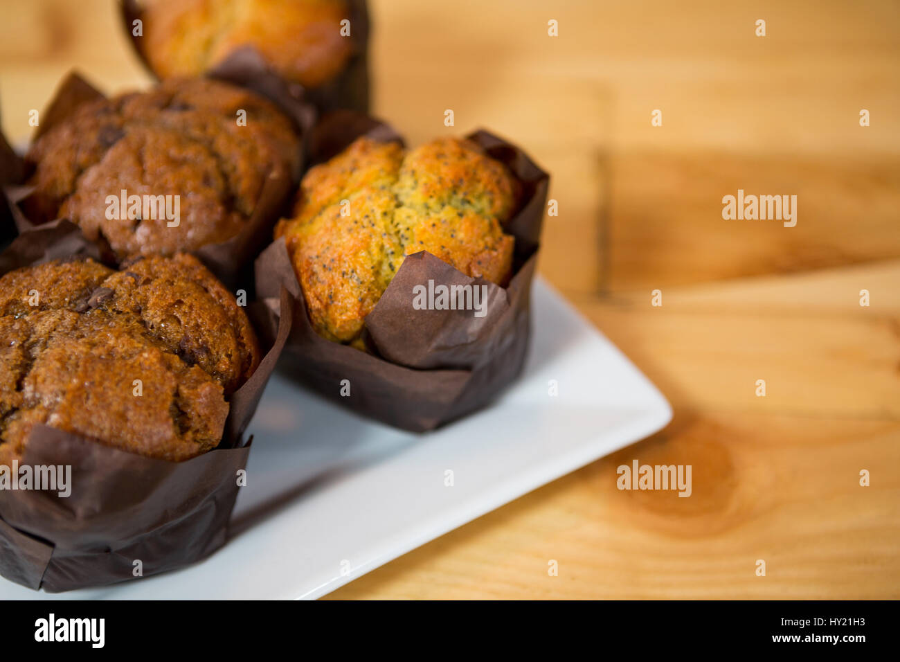 Close-up of muffins served in plate at coffee shop Stock Photo - Alamy