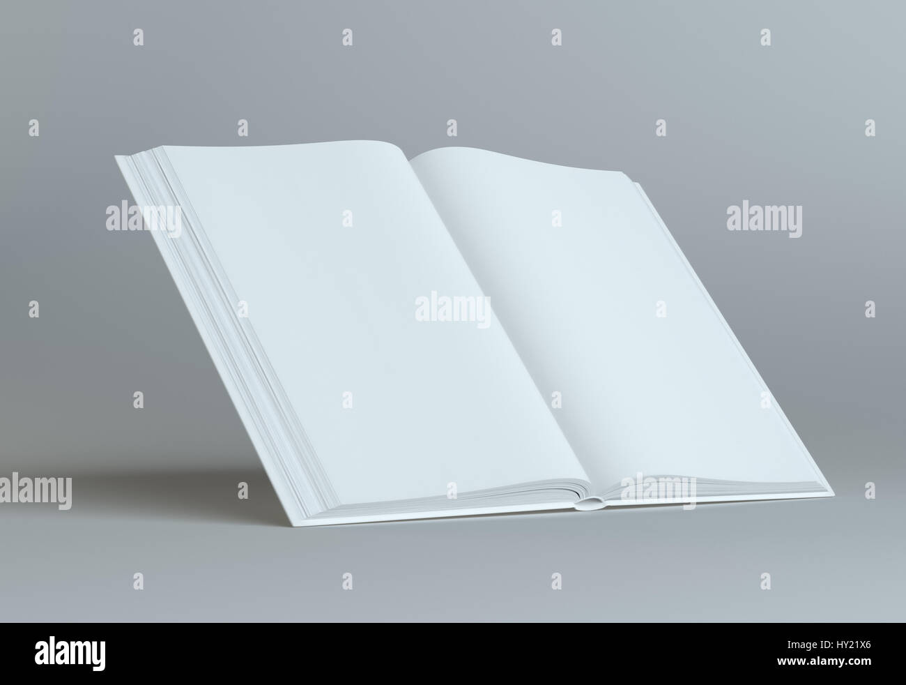 White empty open book on gray background Stock Photo - Alamy