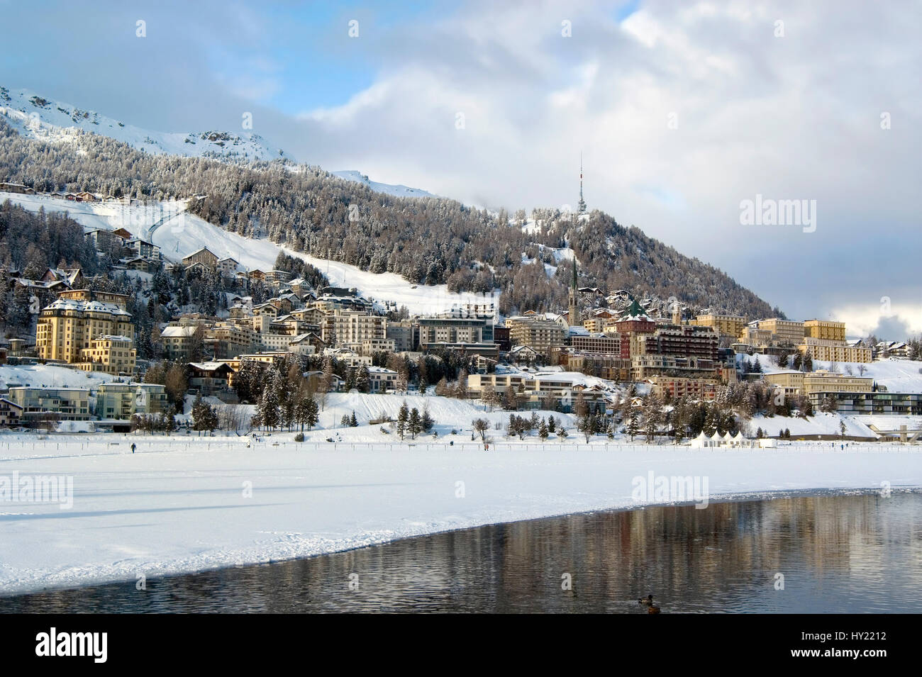 Town centre of St.Moritz Village and the Lake St.Moritz in Winter ...