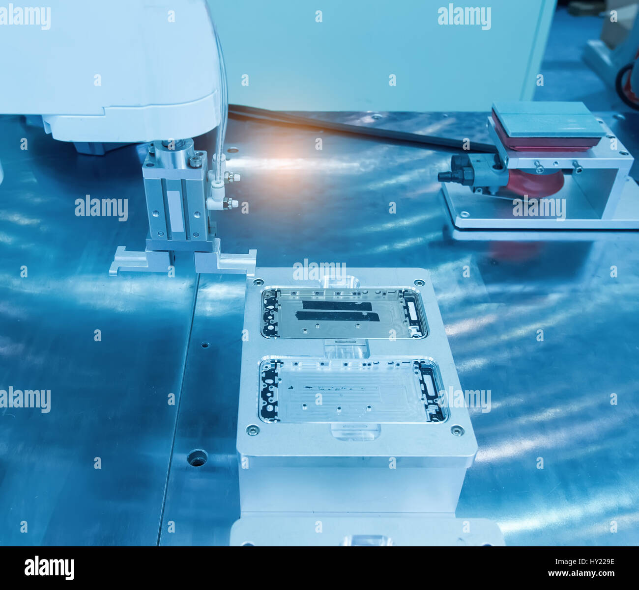 Robotic machine vision system in phone factory Stock Photo - Alamy