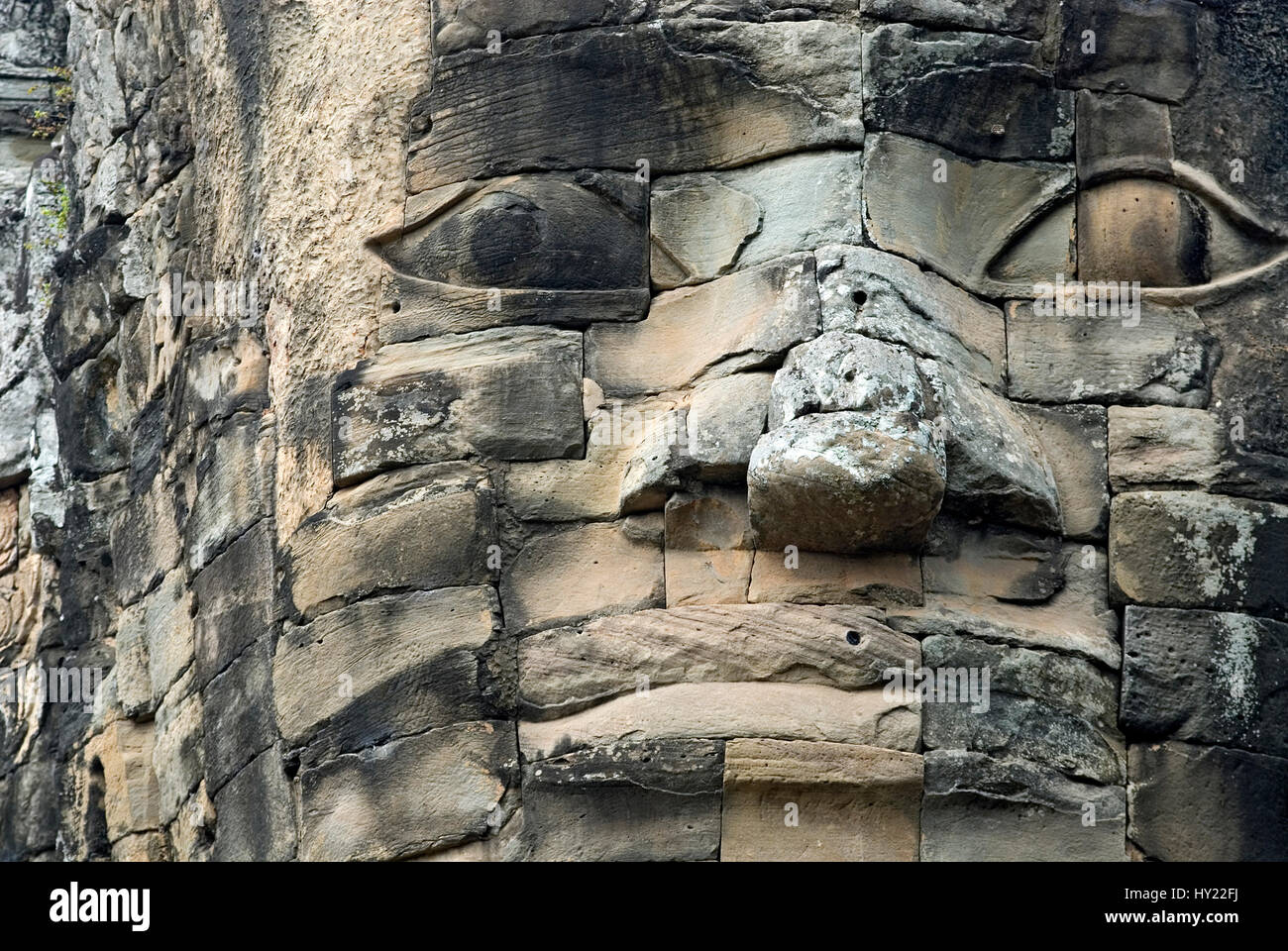 This stock photo shows a close up of the face of a temple stone ...