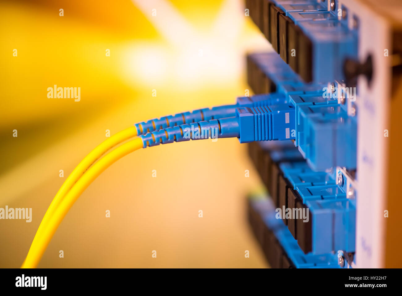 fiber optic telecommunication cables on blur background Stock Photo - Alamy